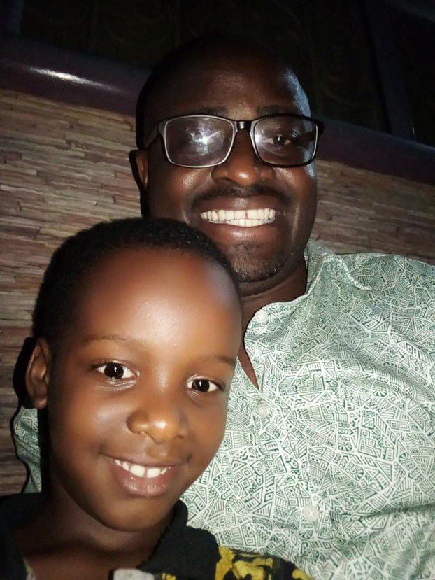 The "why are you geh" main character- Simon Kaggwa Njal and his son. - 9GAG