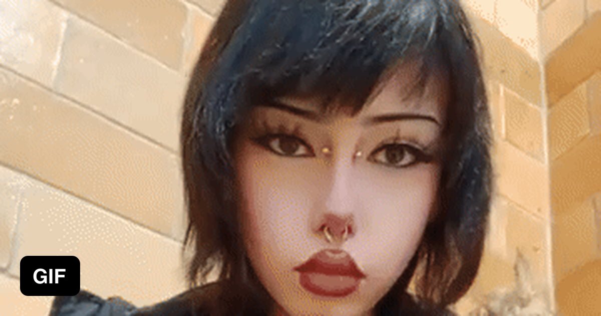 Stretching out her top. - 9GAG