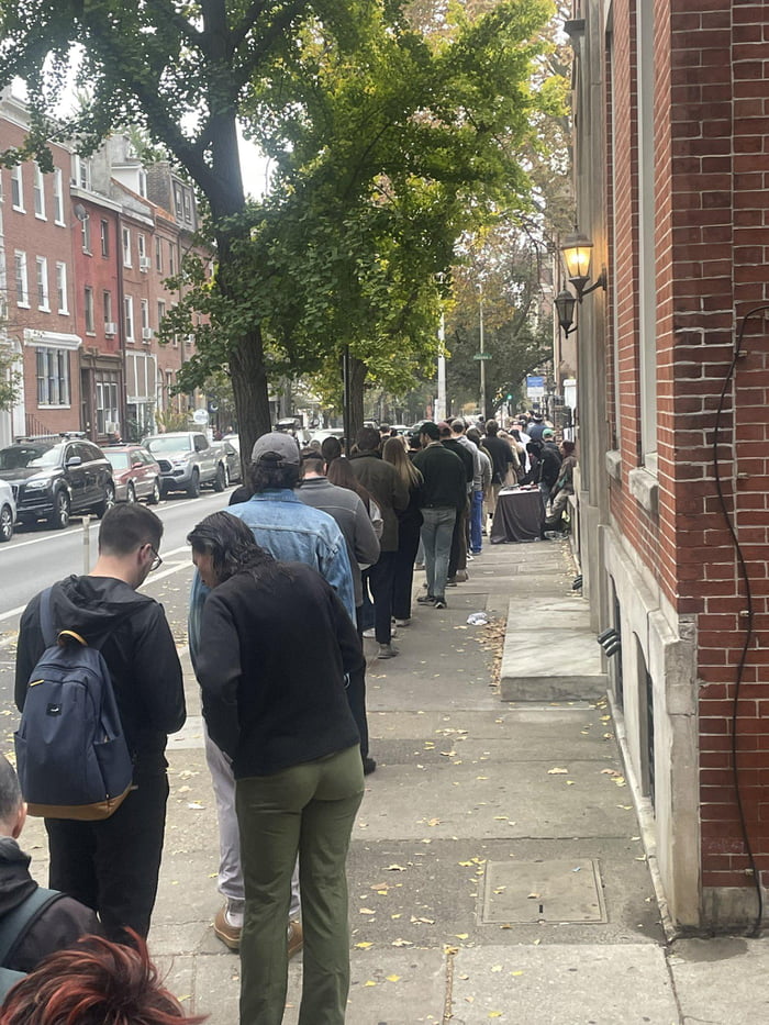 Line going down the block for voting in Philadelphia - 9GAG
