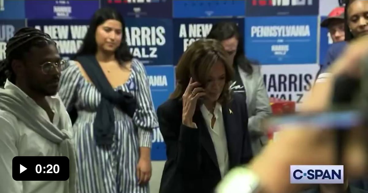 Kamela Harris caught pretending to be on the phone - with the camera (lol) app - 9GAG