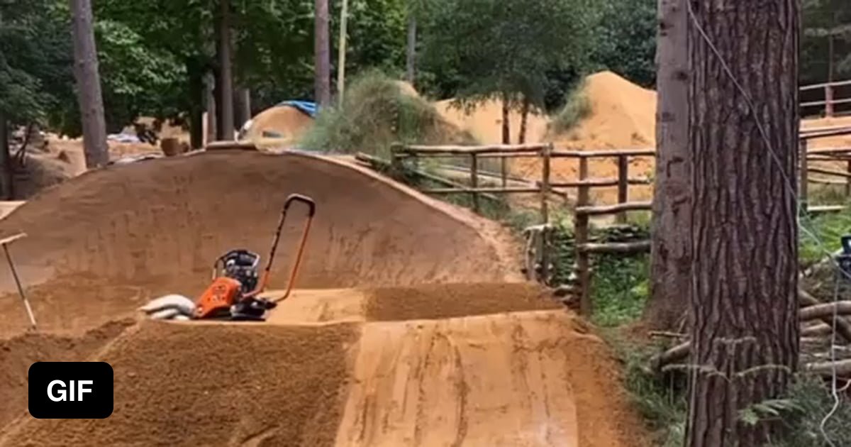 This master craftsman putting the finishing touches on some sweet jumps ...