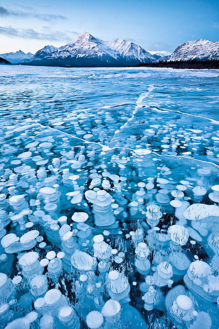 Trapped bubbles in frozen lake - 9GAG
