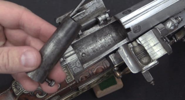 A breechloading wheellock rifle from 1625 that uses a metallic ...