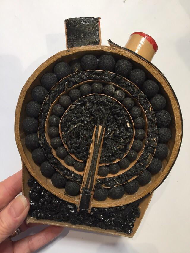 A firework shell cut in half - 9GAG