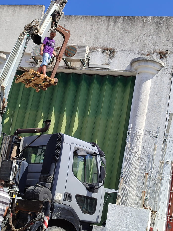 OSHA approved AC unit repair. - 9GAG