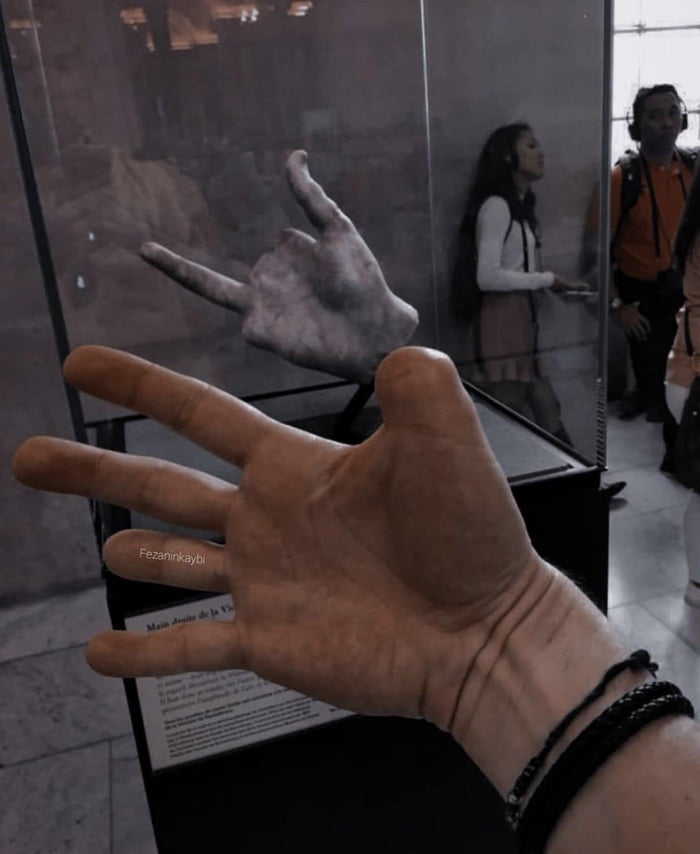 A hand statue with missing fingers - 9GAG