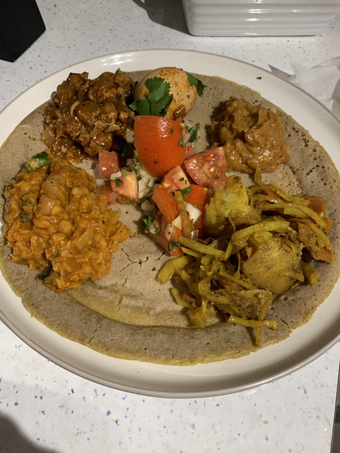 Ethiopian food. Doro Wat, Shiro, Tumtummo, aletcha, injera, and a ...
