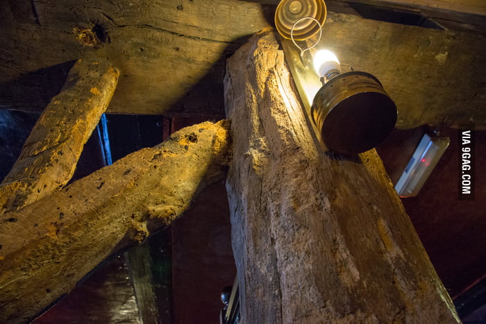 A 554 year old post, holding up a 554 year old beam, holding up the top ...