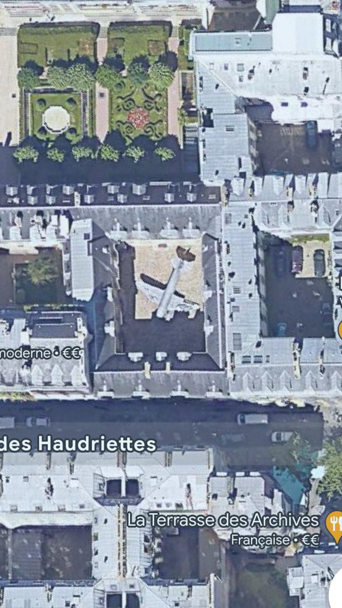 There’s a plane in a backyard of a Parisian building and that’s visible ...