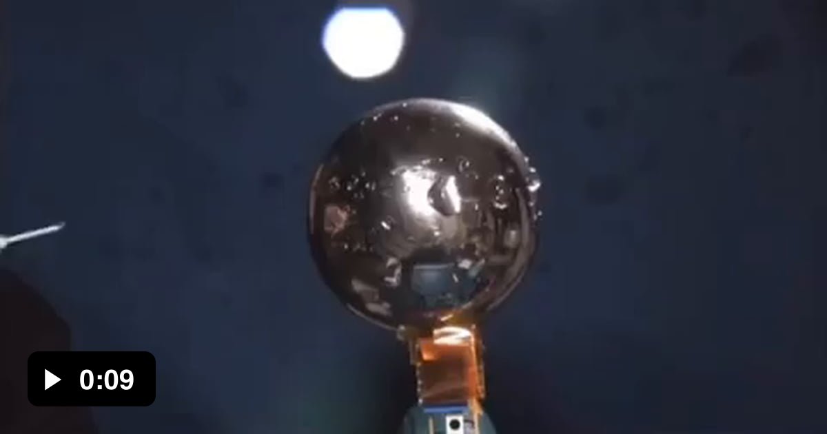 Water droplets orbiting a charged metal sphere on the ISS. - 9GAG