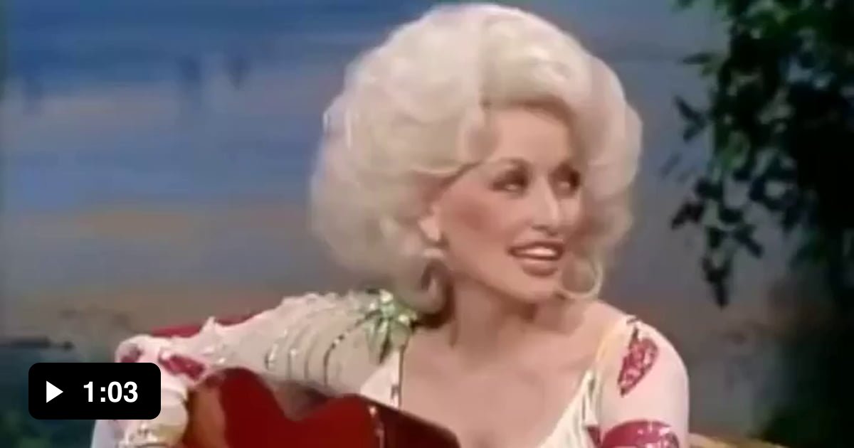 Dolly Parton playing her guitar with acrylic nails on the Carson ...
