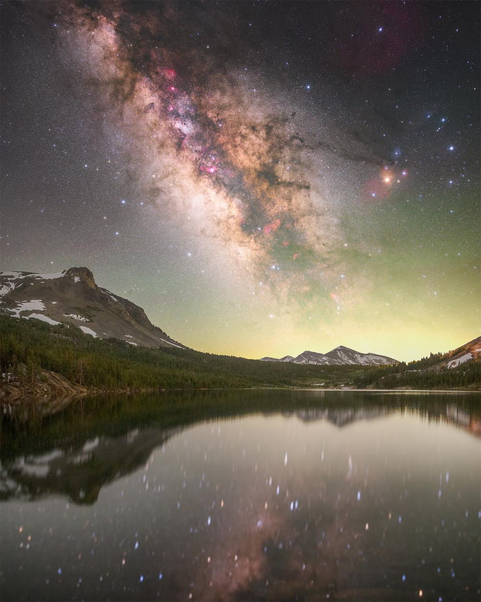 The Milky Way and its reflection, captured with a modified camera. - 9GAG