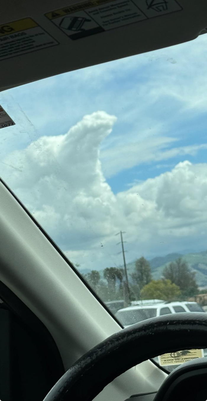 Godzilla coming out of the clouds - 9GAG