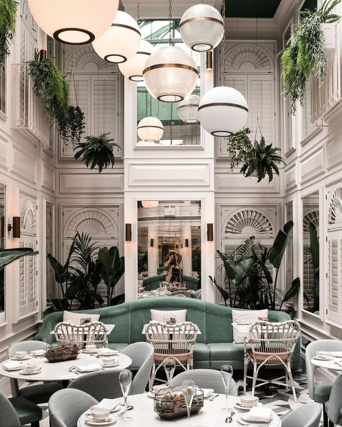 Restaurant in the atrium of a hotel, originally built as the house of a ...