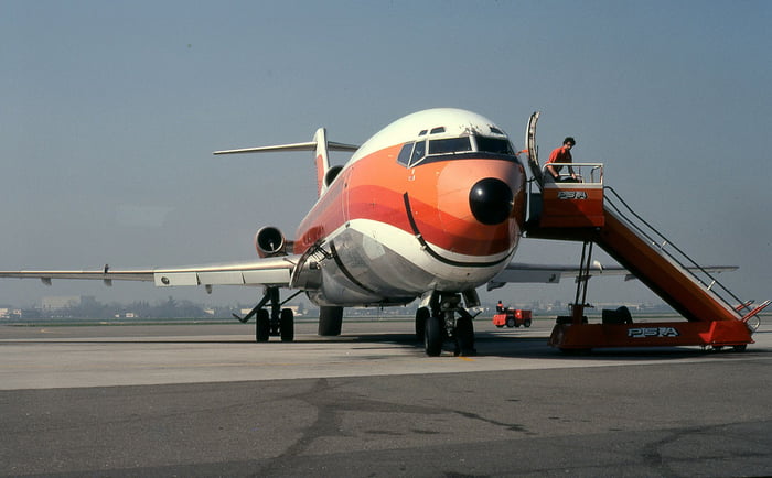 A smiling Pacific Southwest Airlines 727 - 9GAG