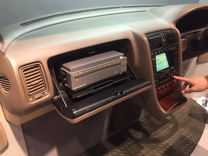 Lexus LS400 with factory installed optional Fax machine. - 9GAG