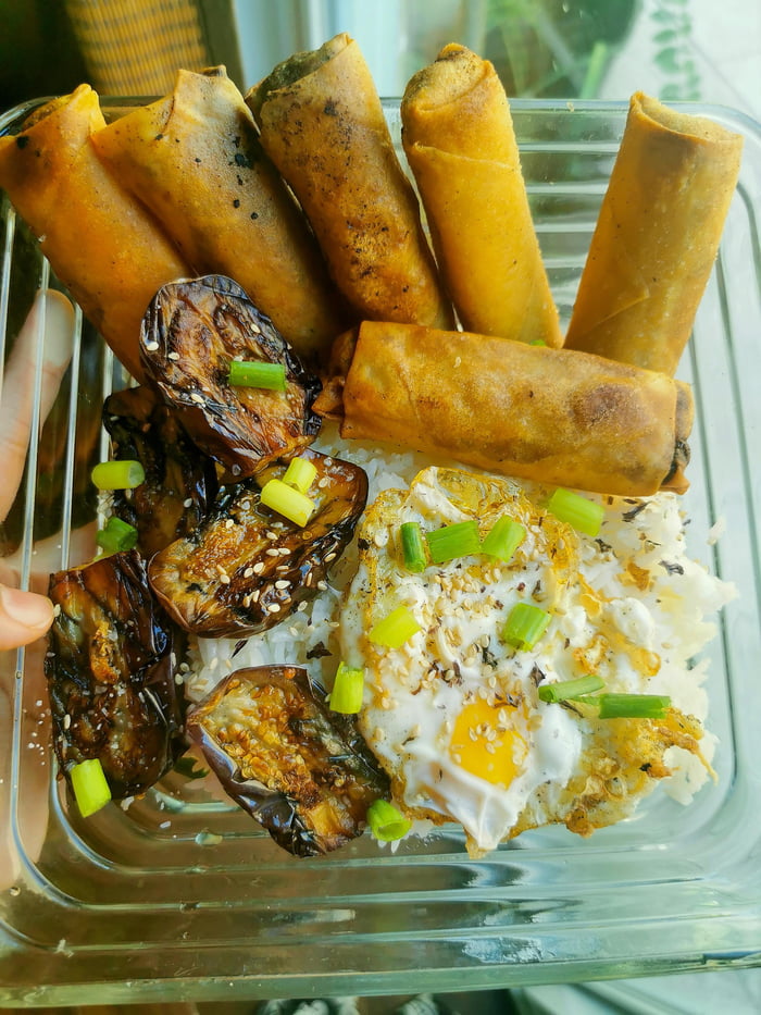 Filipino lumpsilog (lumpia, garlic fried rice, egg) and grilled ...