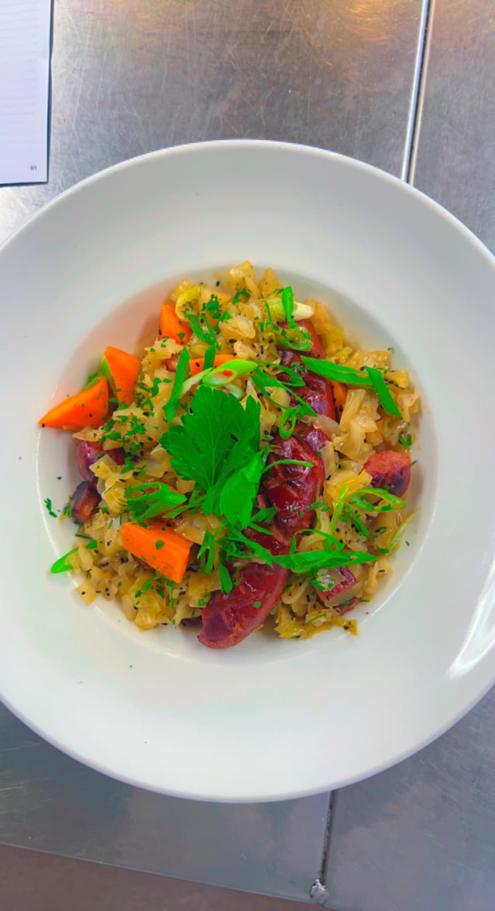 Beer Braised Cabbage with Caraway seeds, topped with Green onions and ...