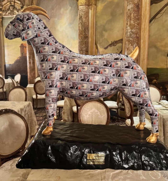 Golden-hoofed goat statue covered in $100 bills is displayed at Mar-a ...