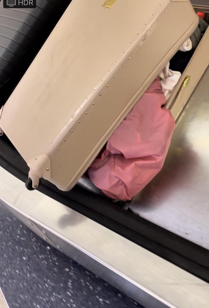 Luggage arrived on the belt looking like this with over $1000 worth of snowboarding equipment ...