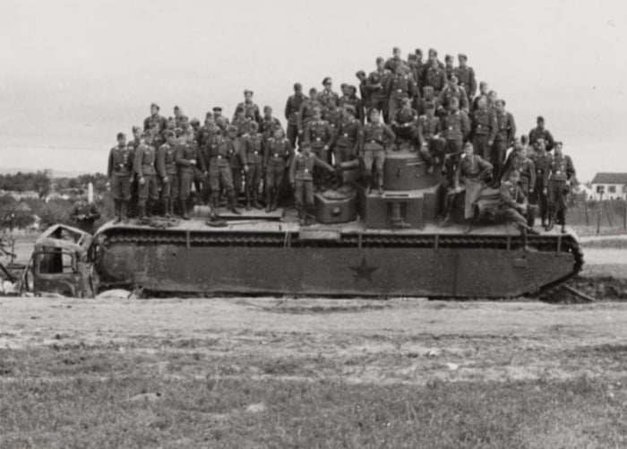 A German unit pictured on top of a captured Red Army T-35 multi-turret ...
