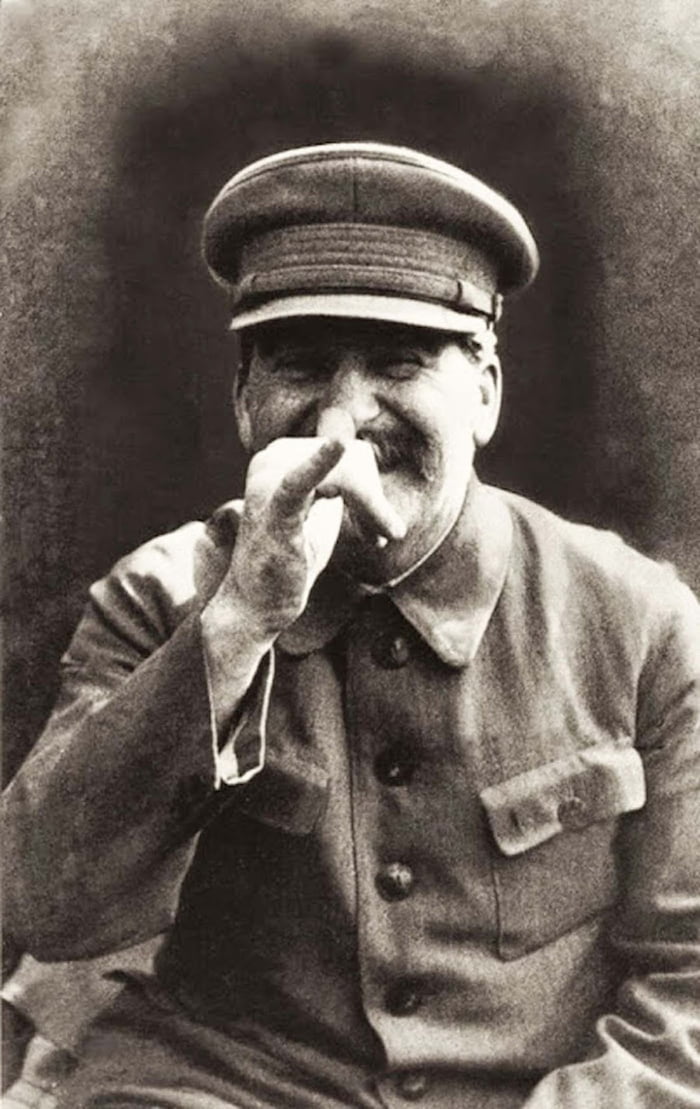 Joseph Stalin posing for a private photo. Circa 1940s. - 9GAG