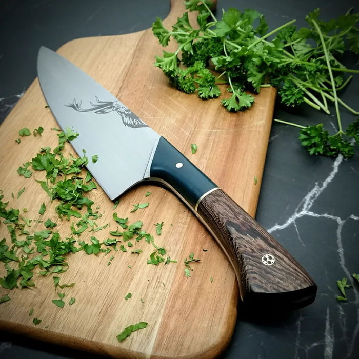 Finished making this chefs knife yesterday. I made the handle of ...