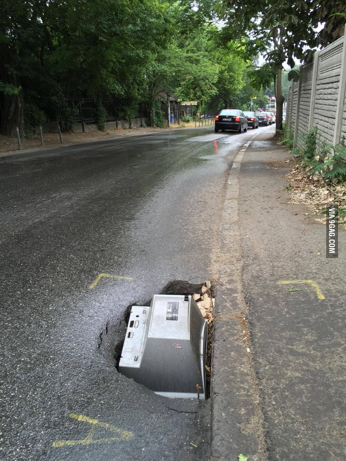Pothole... how to cover in Romania - 9GAG