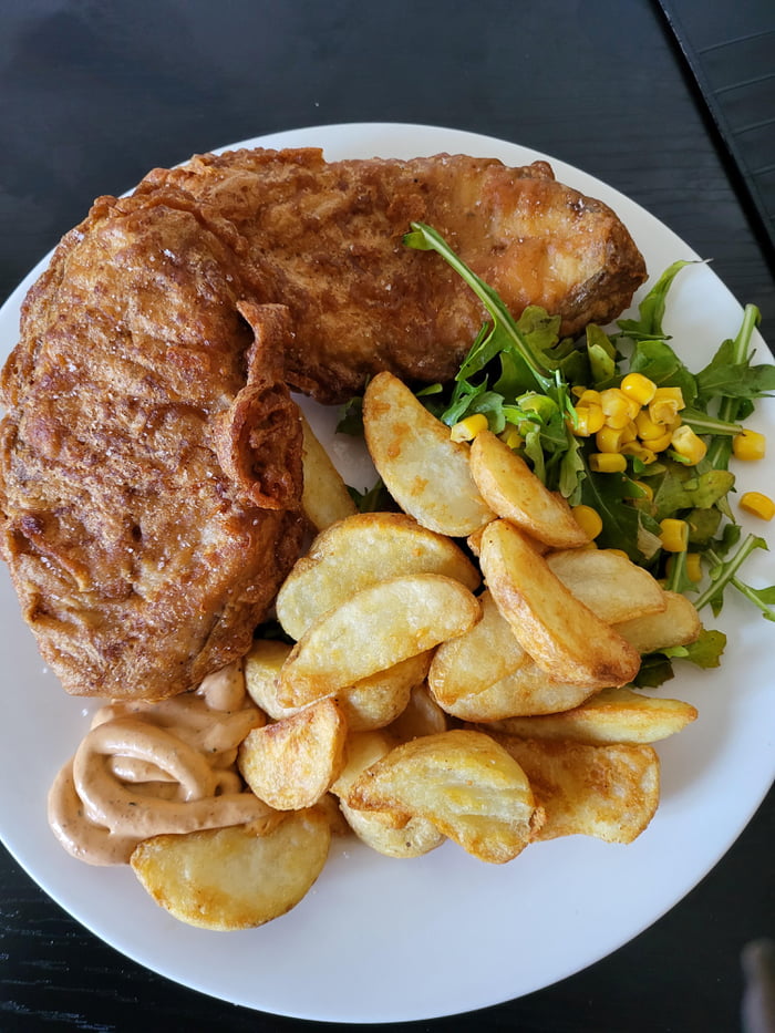 Home made fish (snapper steaks), chips (wedges) with a rocket corn ...