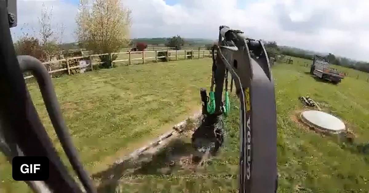 Taking down an old fence with heavy machinery - 9GAG