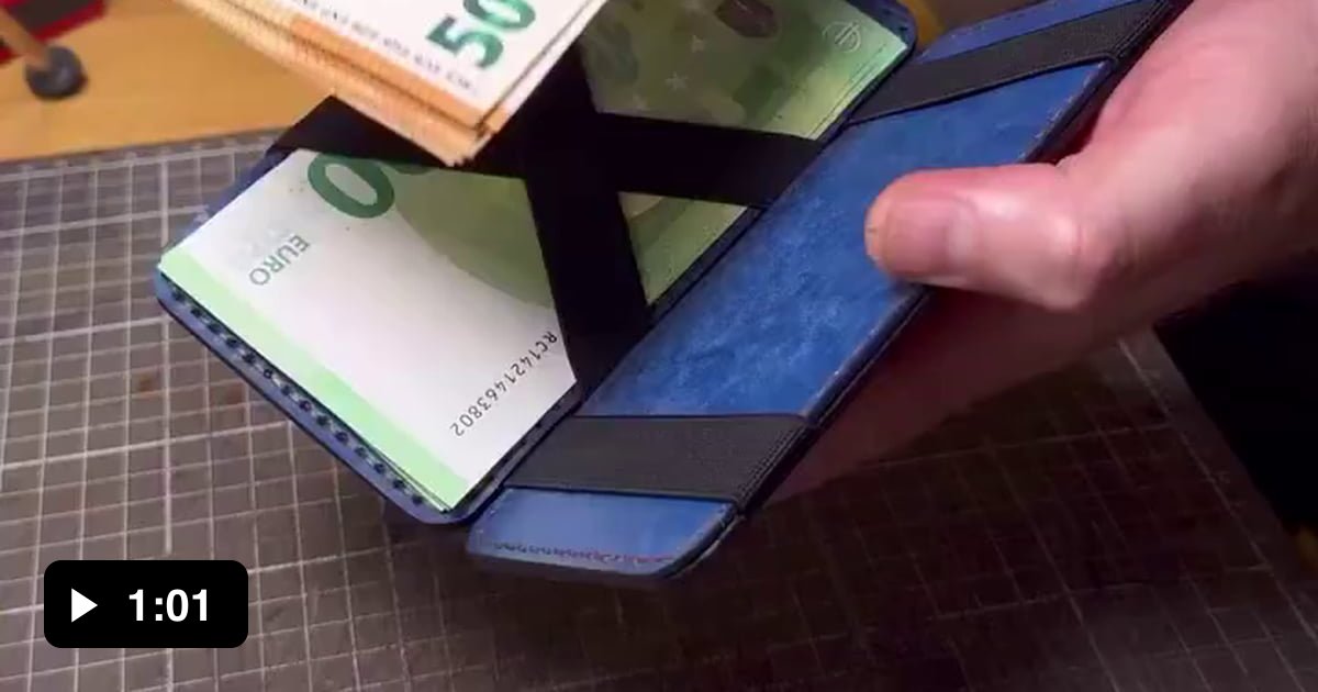 Hand crafting a wallet that utilizes straps. - 9GAG