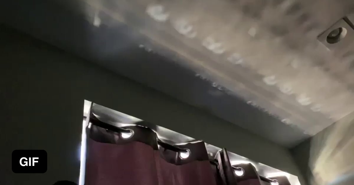 Curtains creating a 'natural' pinhole camera that projects images of ...