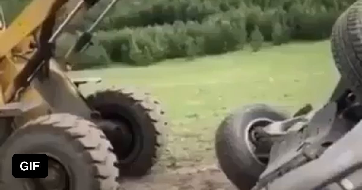 Using a bulldozer to flip back the car - 9GAG