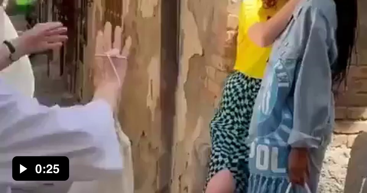 Nun freaks out after seing two women kissing on the street for a photo shoot. - 9GAG