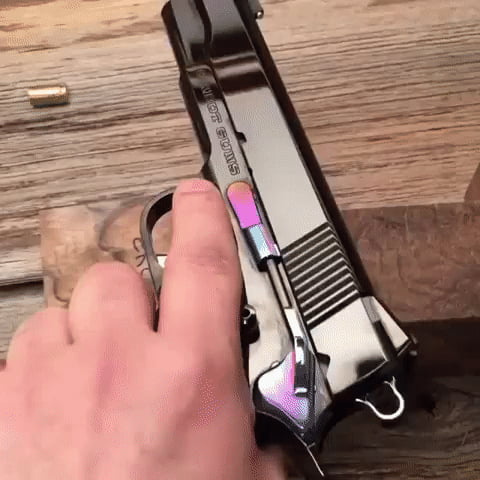 IRL "Oil Spill" pistol skin - 9GAG