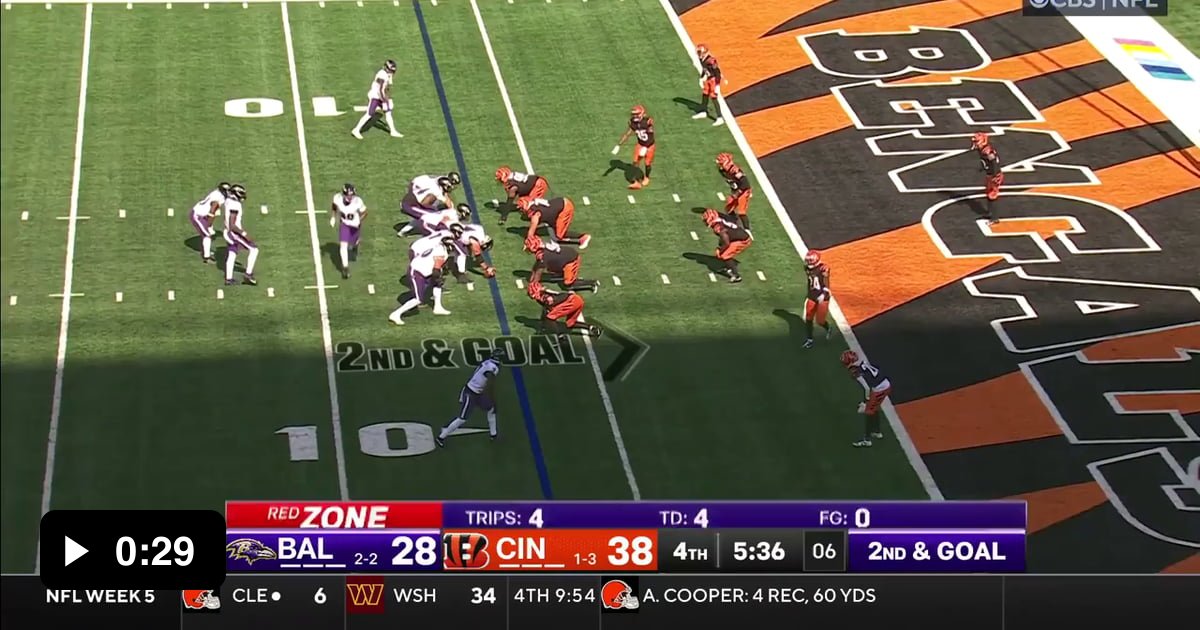 Lamar Jackson drops snap, recovers, stiff arms pass rusher, throws ...