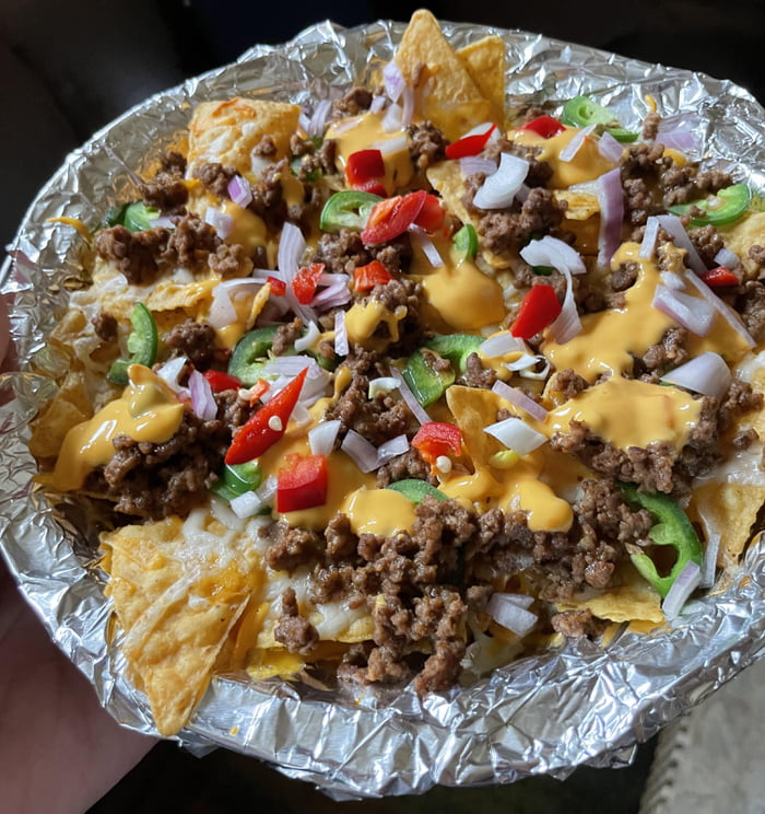 Processed cheese/rust colored meat/bargain brand chips= trashy ...