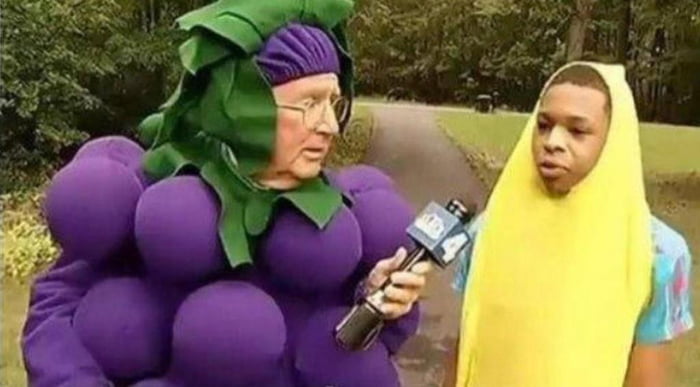 Reporter Pat Collins dressed up like a bunch of grapes to show support ...