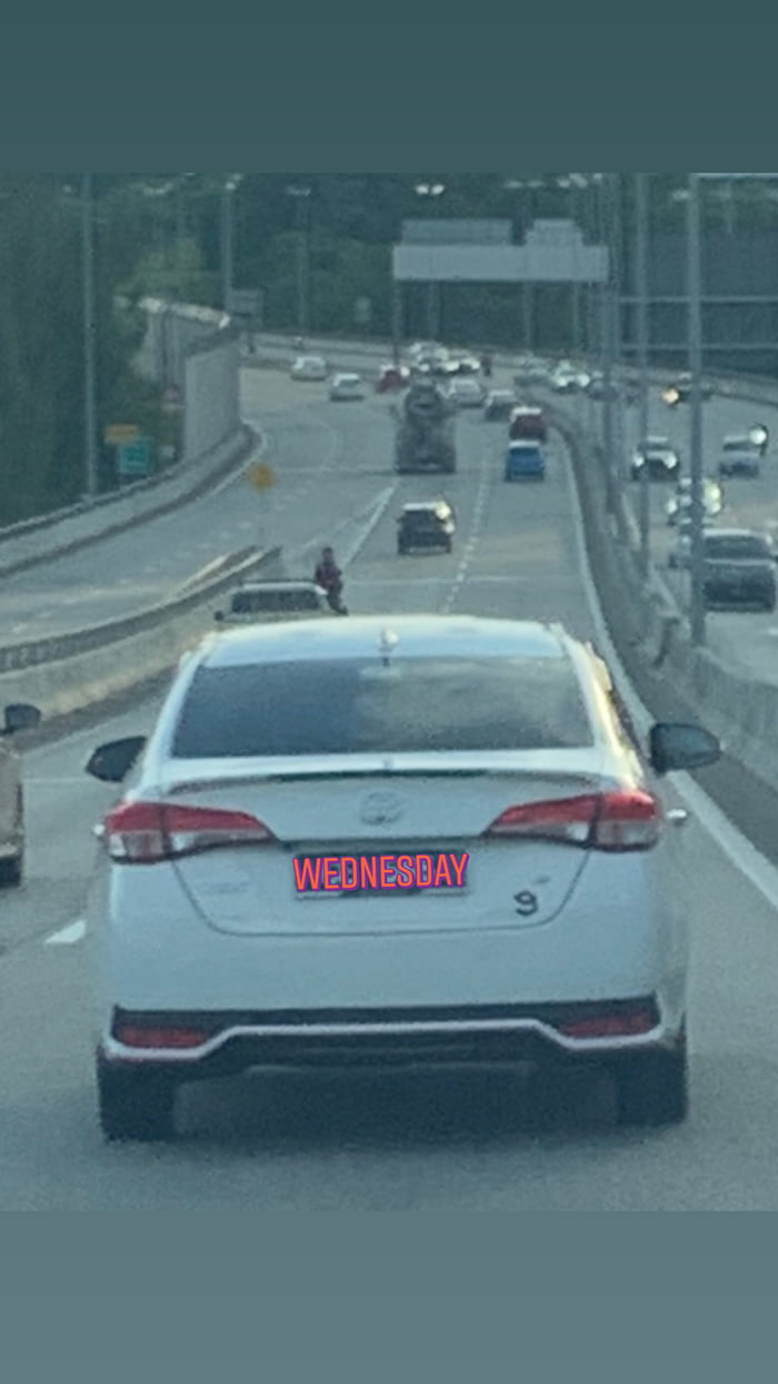 9GAG sticker on Malaysian car. Show yourself, I have something to tell ...