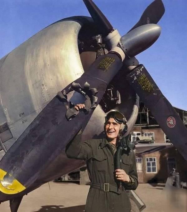 WWII Pilot checking his plane after a dogfight. - 9GAG