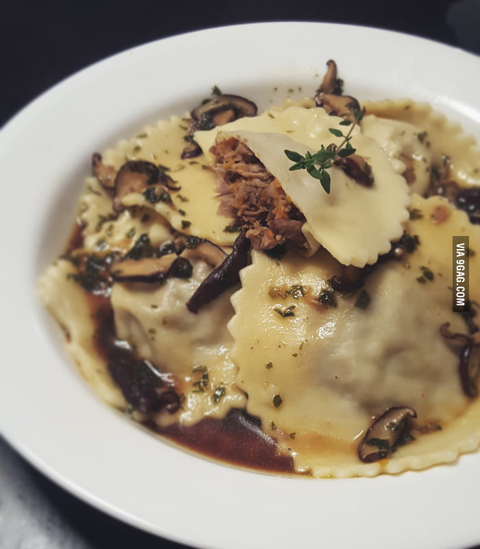 Braised lamb shank ravioli with a shitake and parsley broth. - 9GAG