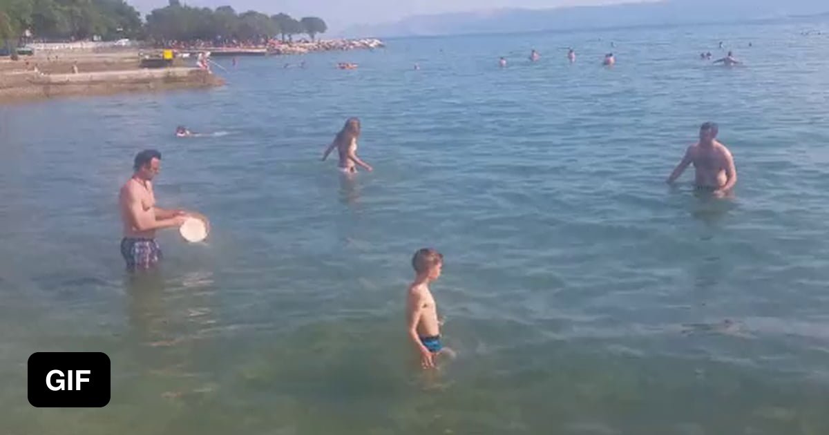 Two men playing frisbee. - 9GAG