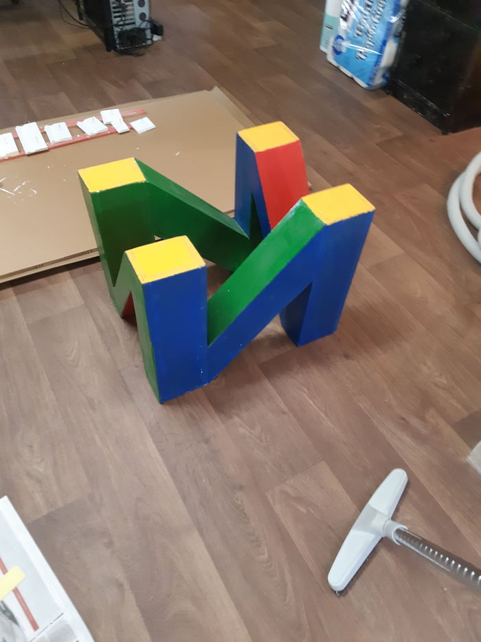 Table in the N64 logo made by hand . First project ever . Would fit ...