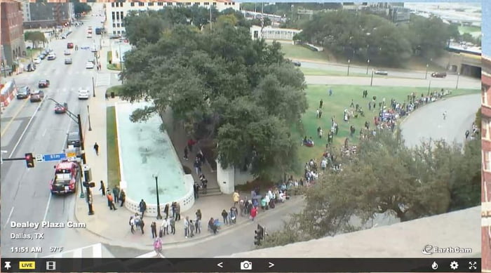 A screen shot of a streaming camera view of Q followers expecting JFK ...