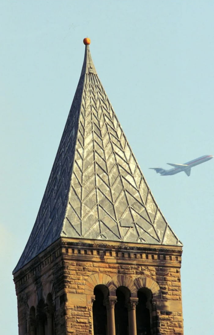 20 years ago, someone impaled a 60 pound pumpkin on the top of a spire ...