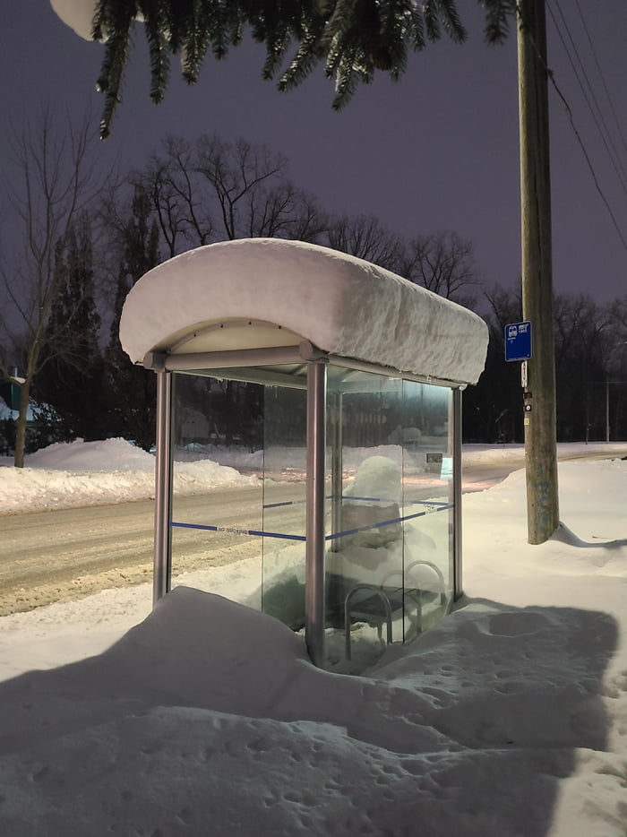 The snow on top of this bus stop - 9GAG
