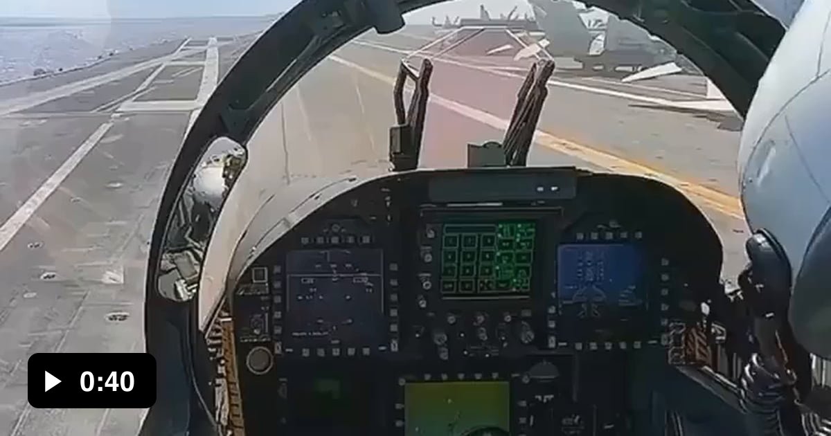 View from inside of an F-18 cockpit as it takes off from an aircraft ...