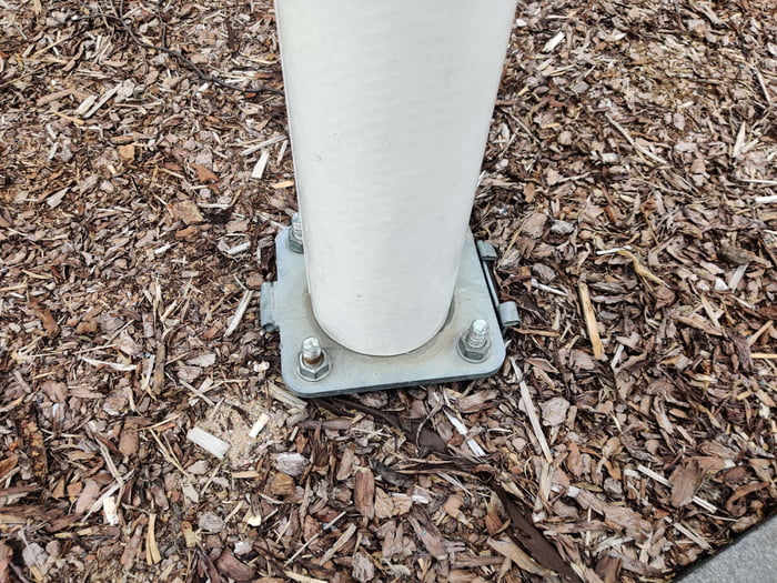 Surely this flag pole would have been easier to install using the ...