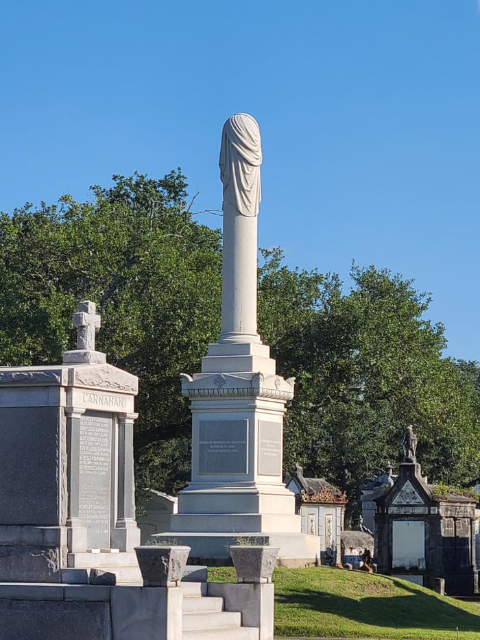 The rather unfortunate design of this cemetery monument when viewed ...