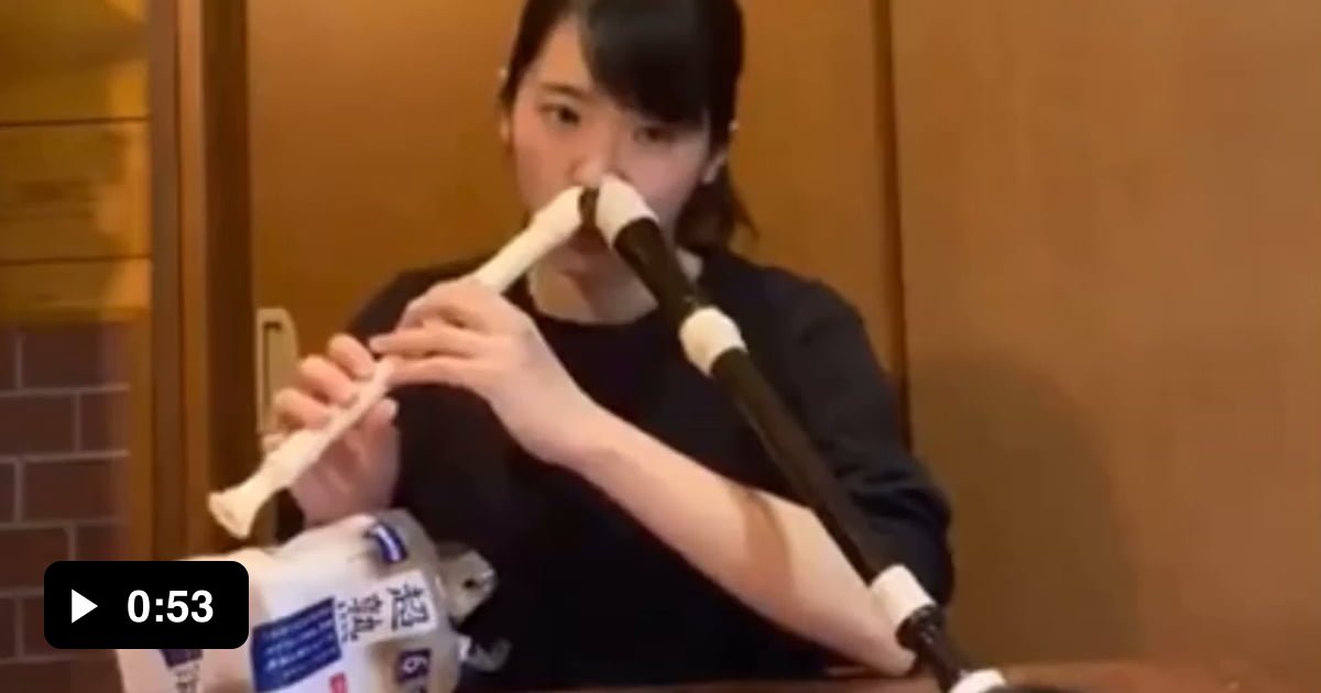 This girl plays two recorders at the same time with her nose - 9GAG